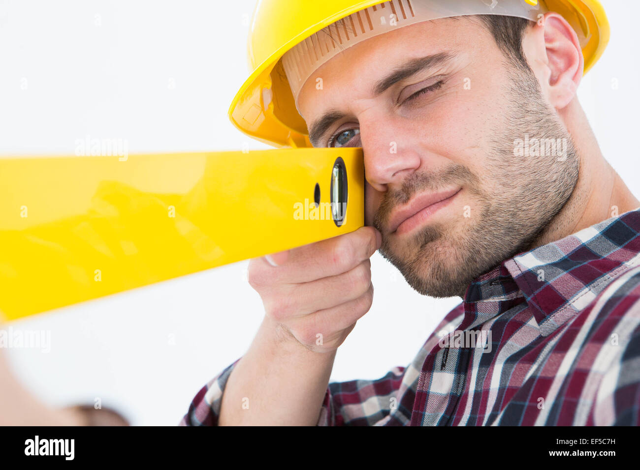 Worker using level tool device hi-res stock photography and images - Alamy