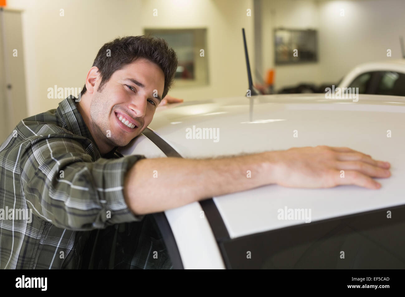Man hugging on a car Stock Photo - Alamy
