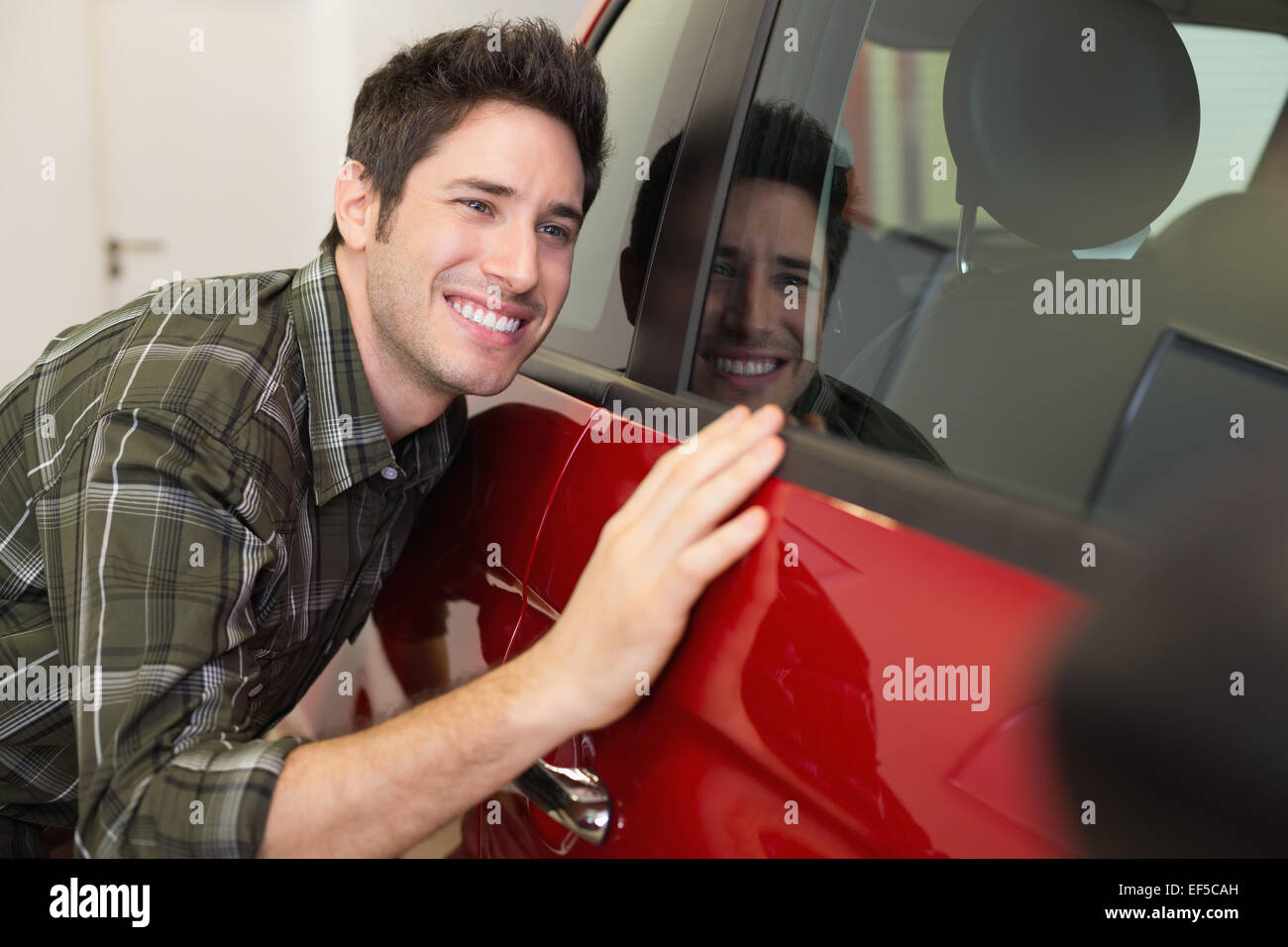 Man hugging his car hi-res stock photography and images - Alamy