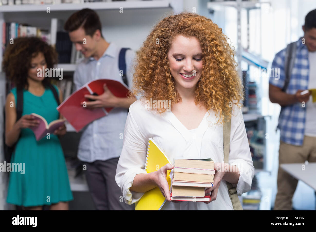 Carrying books to class hi-res stock photography and images - Alamy