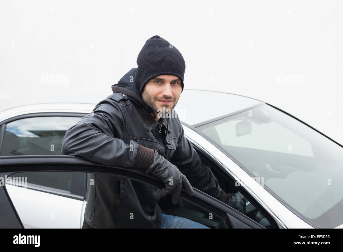 Car thief looking at camera Stock Photo - Alamy