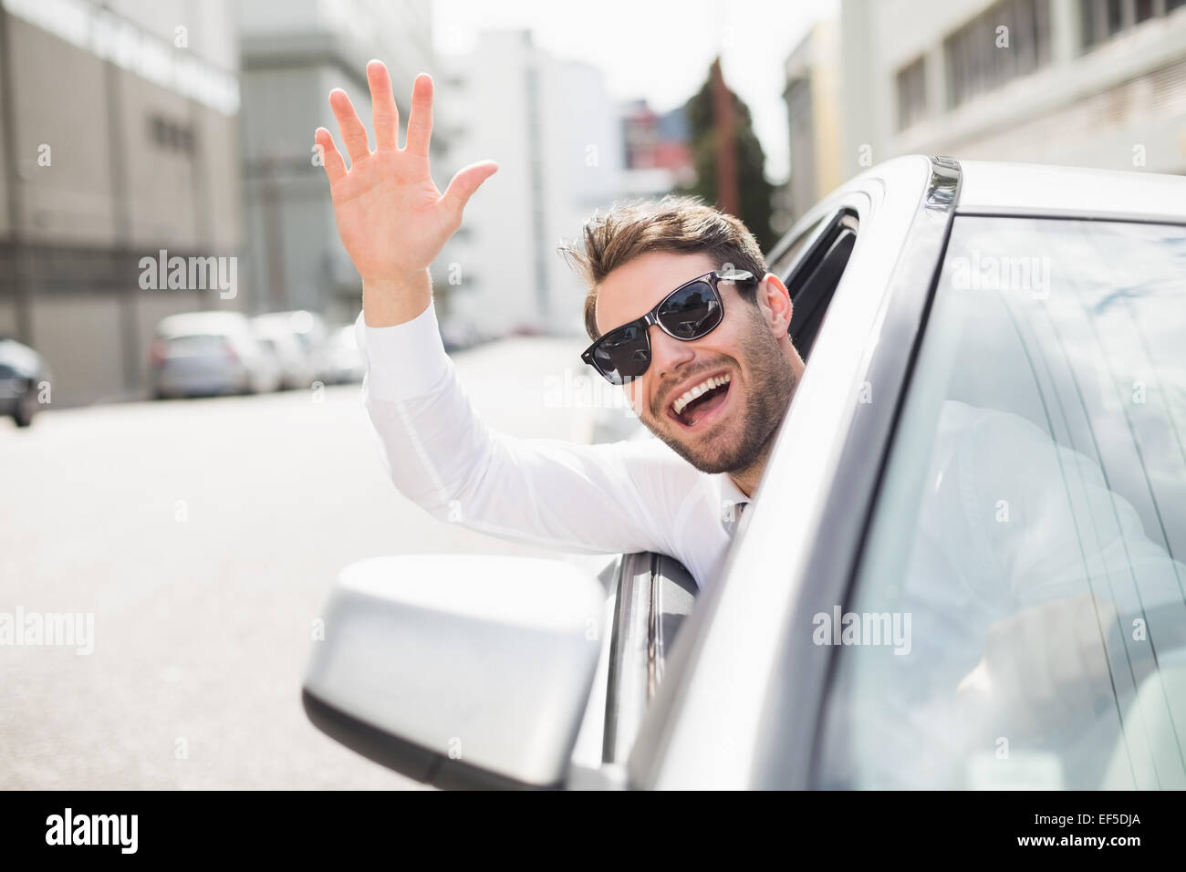 Car drivers waving hi-res stock photography and images - Alamy