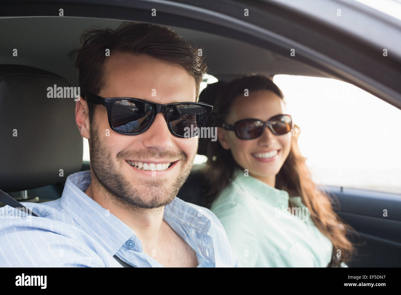 Young couple on a road trip Stock Photo - Alamy