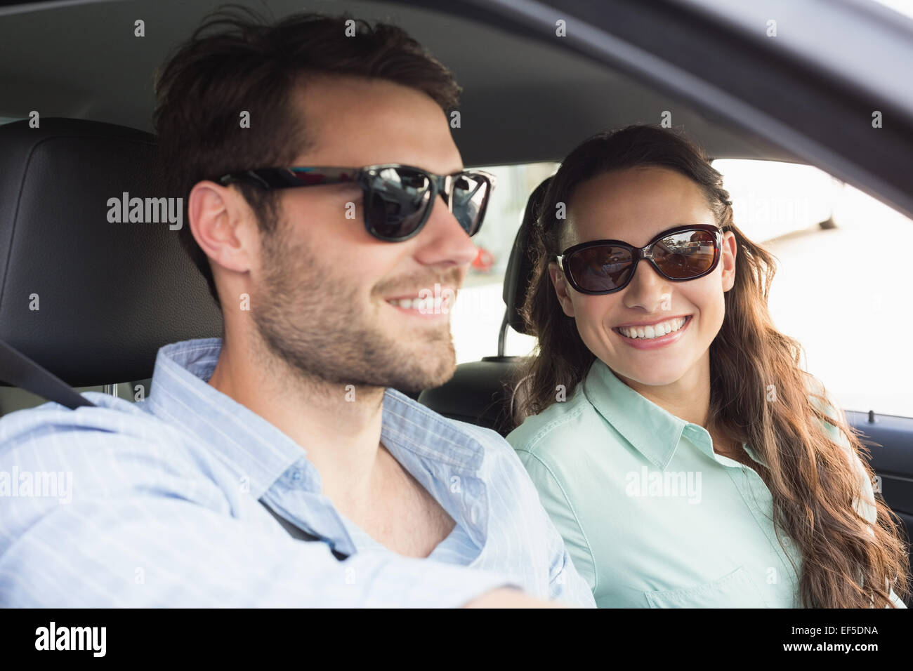 Young couple on a road trip Stock Photo - Alamy