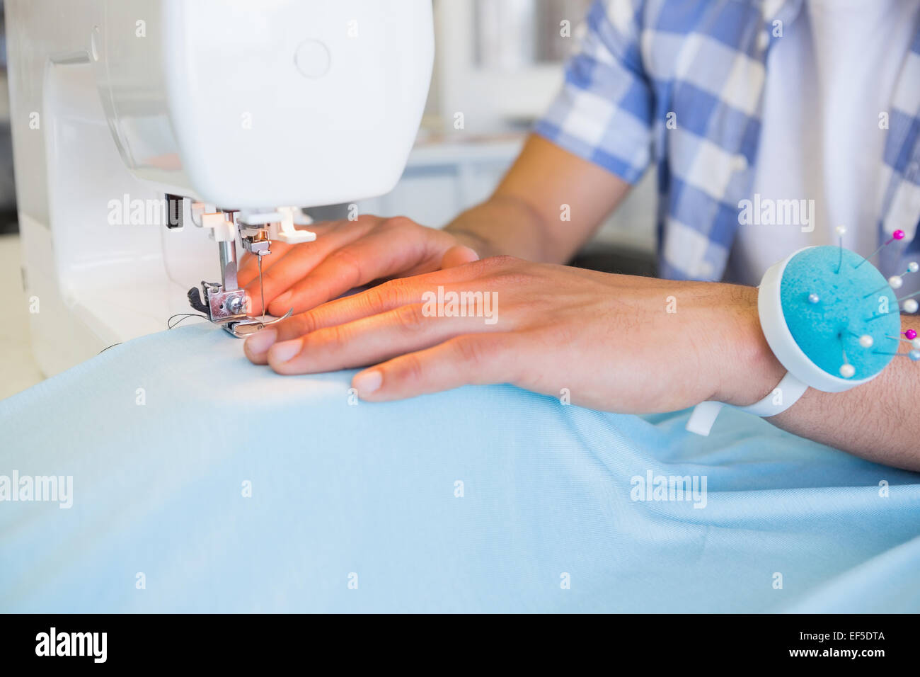 College student using sewing machine Stock Photo - Alamy