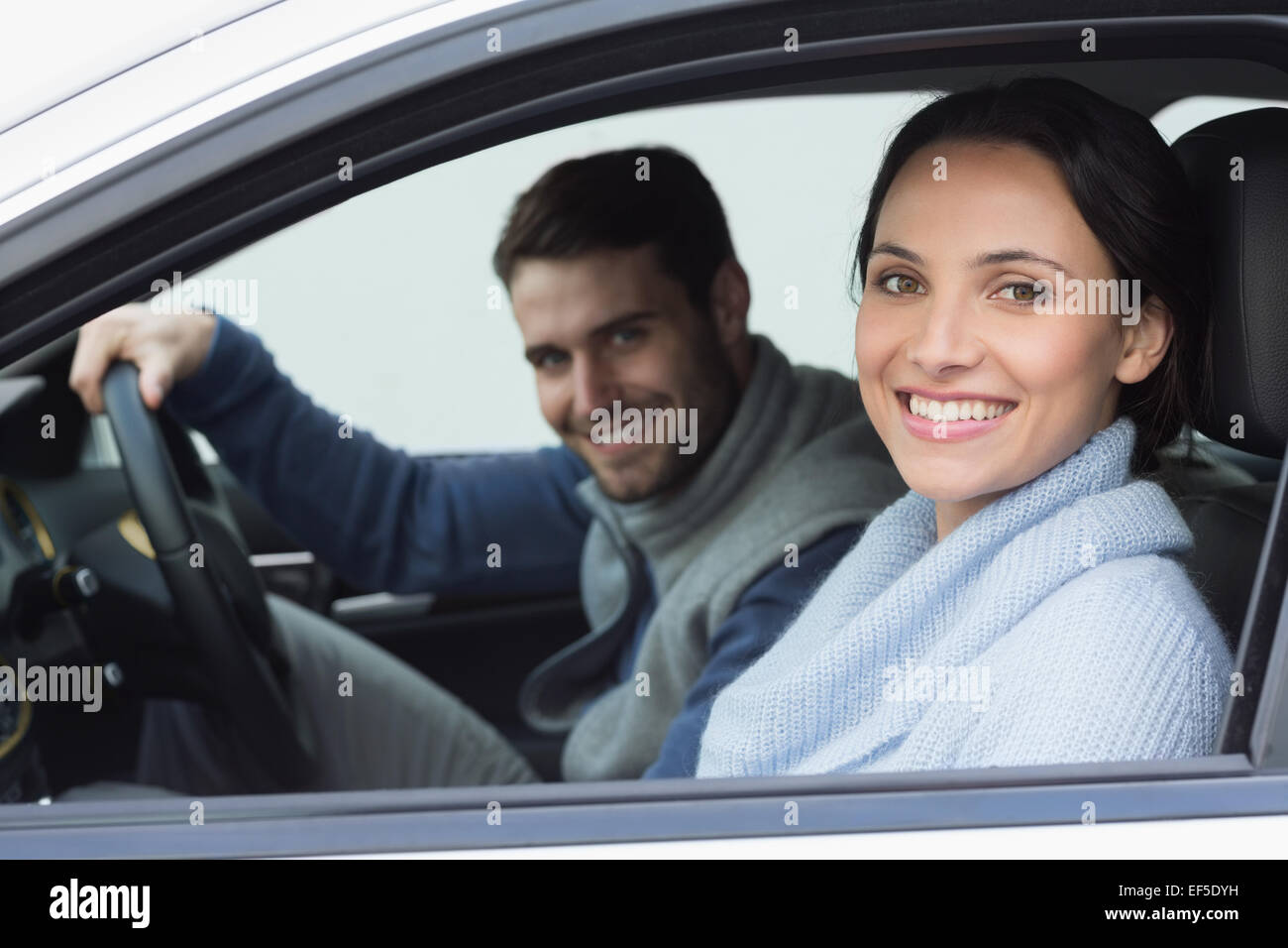 Young couple going for a drive Stock Photo - Alamy