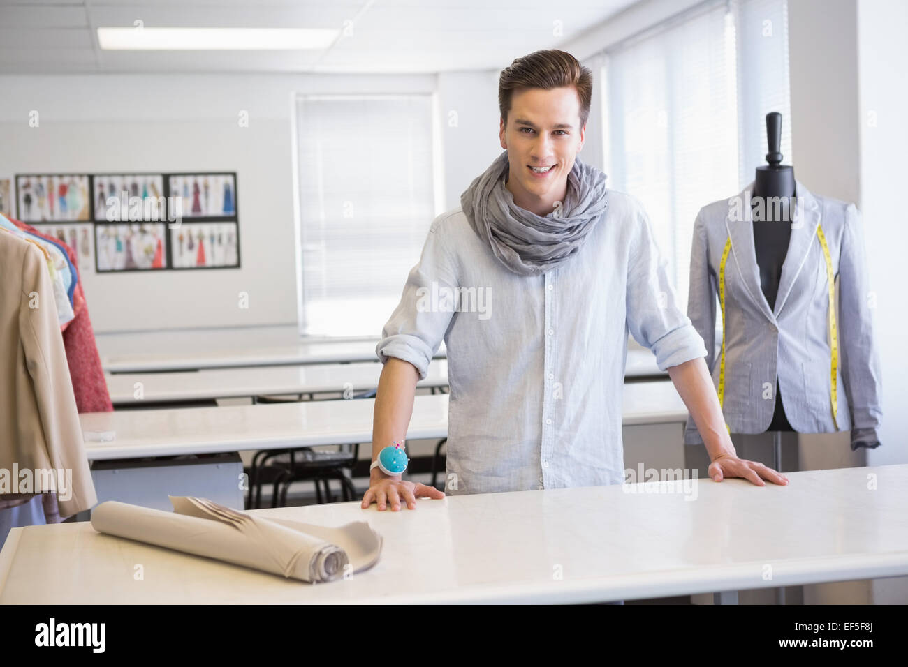 Smiling student posing in classroom Stock Photo - Alamy