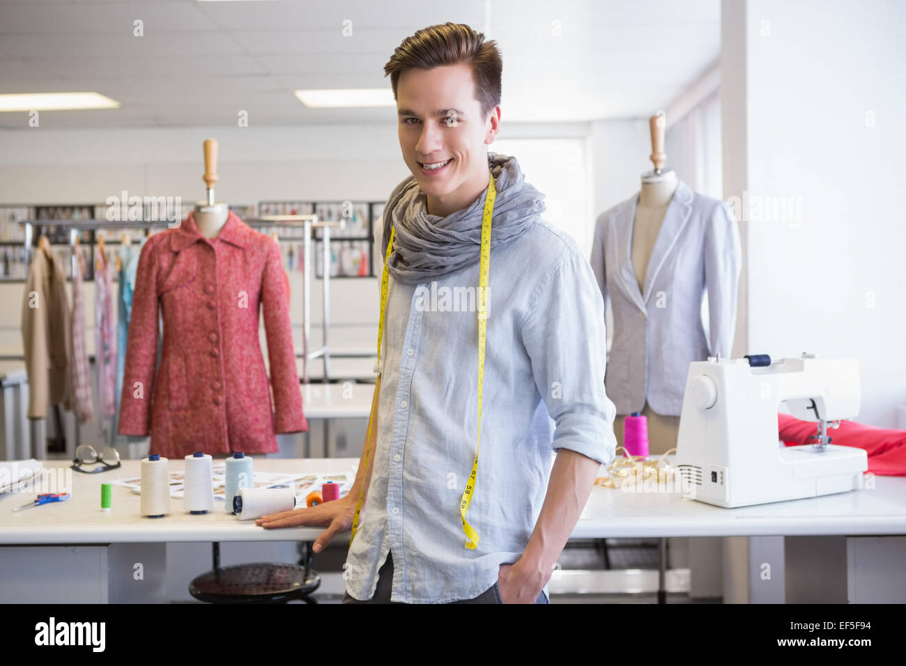 Smiling student posing with meter Stock Photo - Alamy