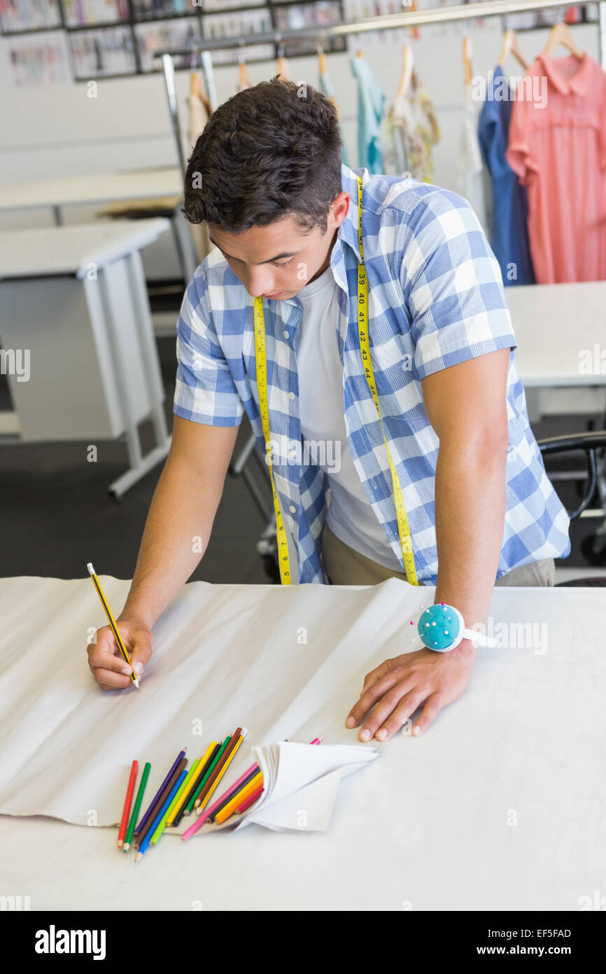 Fashion student drawing patterns Stock Photo - Alamy
