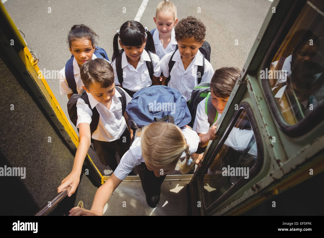 Girl on school bus hi-res stock photography and images - Alamy