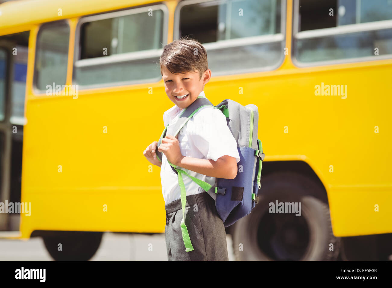 Boy walking to school bus hi-res stock photography and images - Alamy