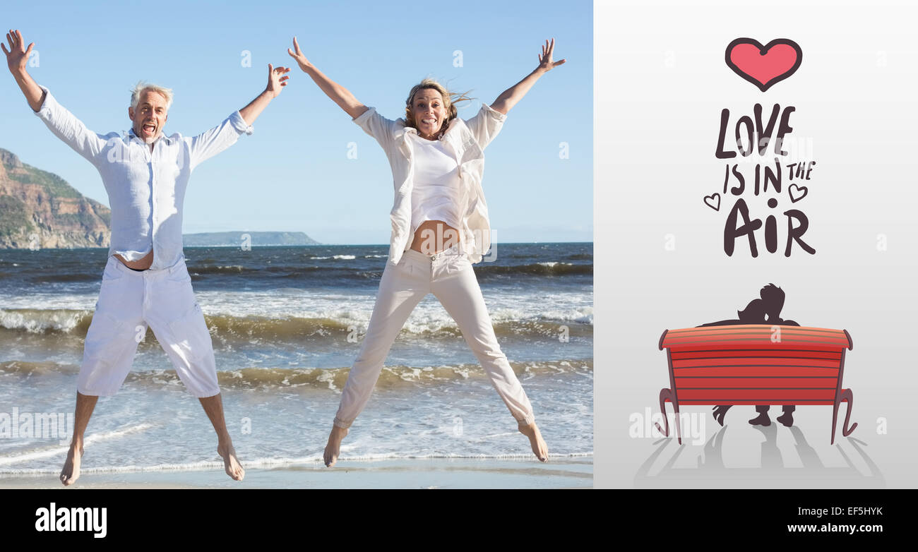 Happy blonde jumping on beach hi-res stock photography and images - Alamy