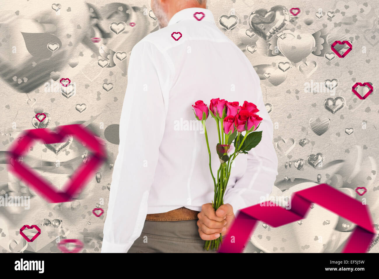 Man with flowers behind his hi-res stock photography and images - Alamy