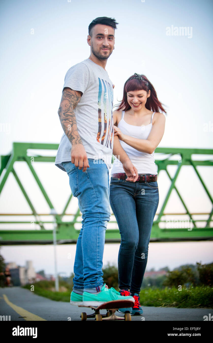 Women helping men hi-res stock photography and images - Alamy