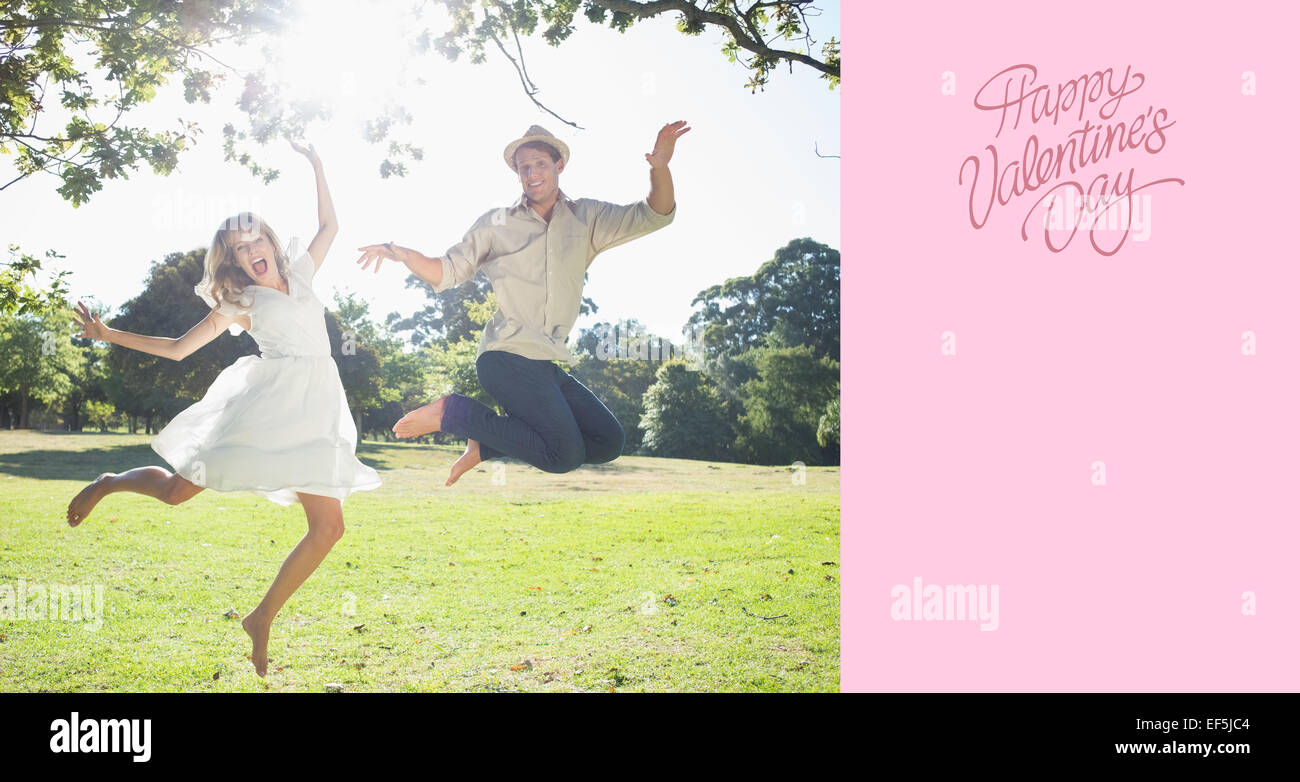 Composite image of cute couple jumping in the park together Stock Photo ...