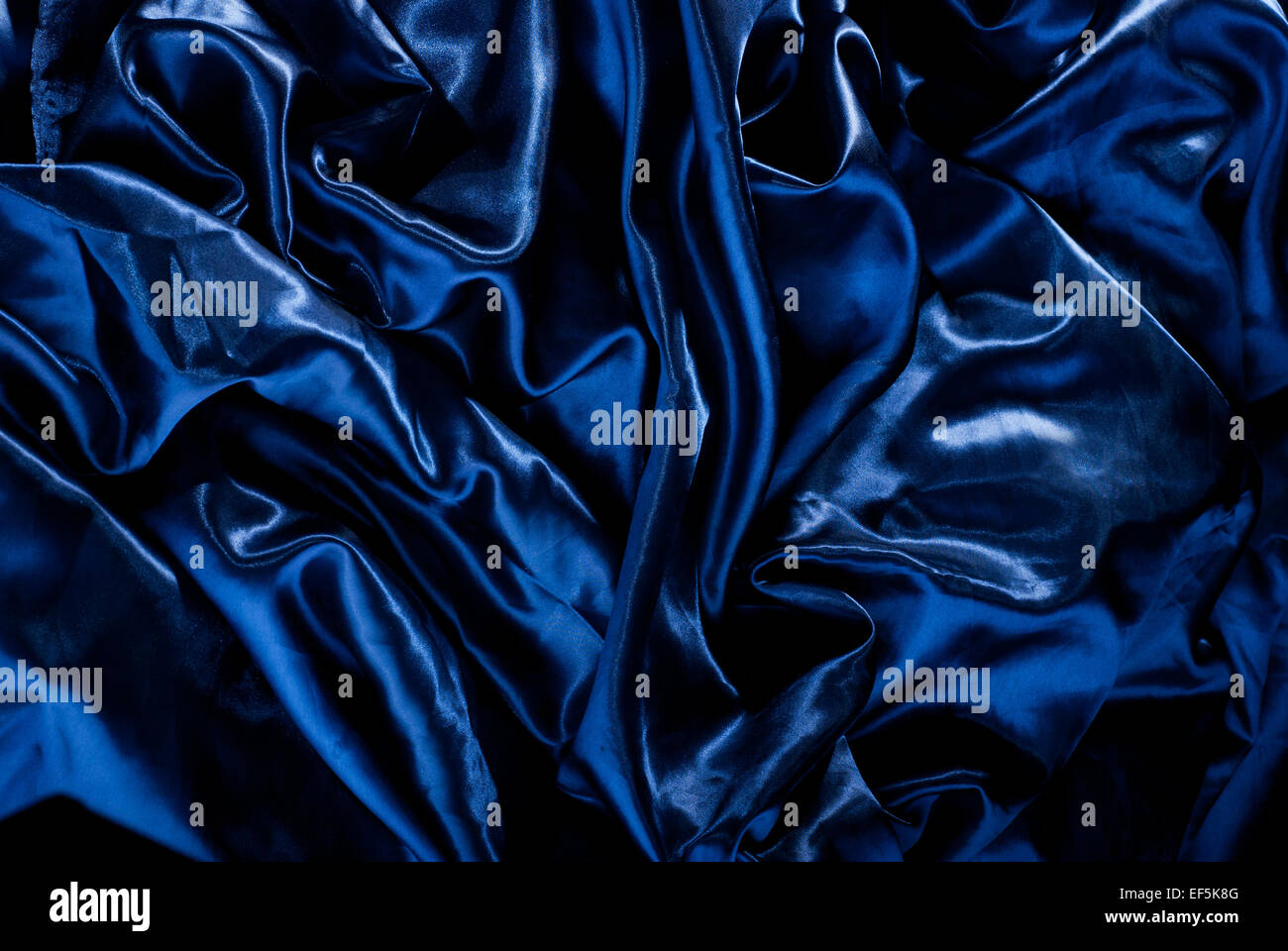 Blue satin fabric background hi-res stock photography and images - Alamy