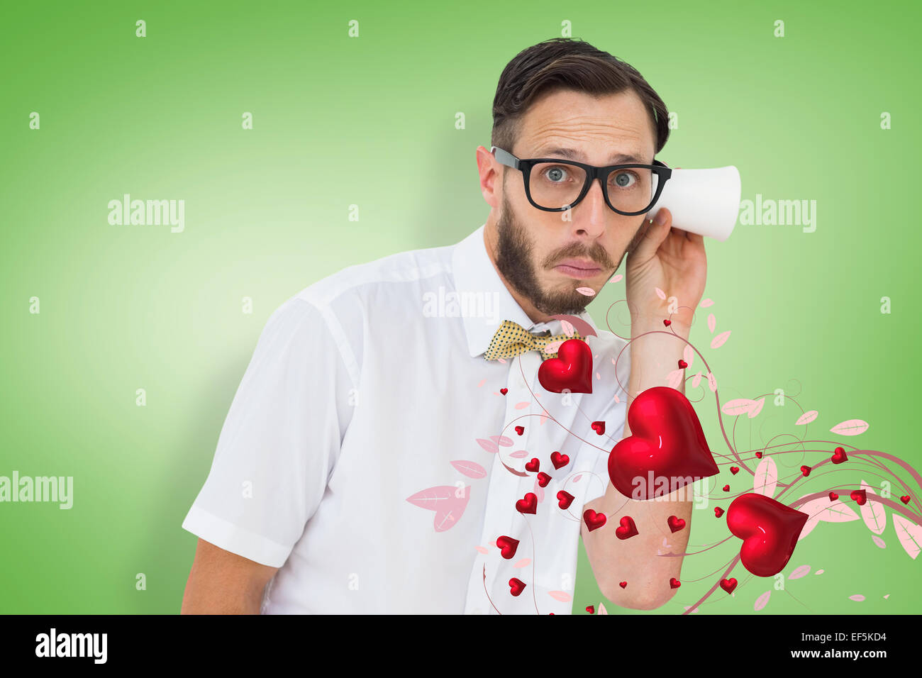 Composite image of geeky businessman eavesdropping with cup Stock Photo ...