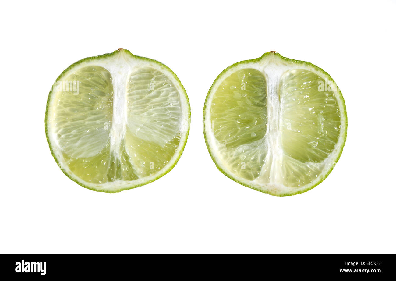 Two halves of a lime Stock Photo - Alamy