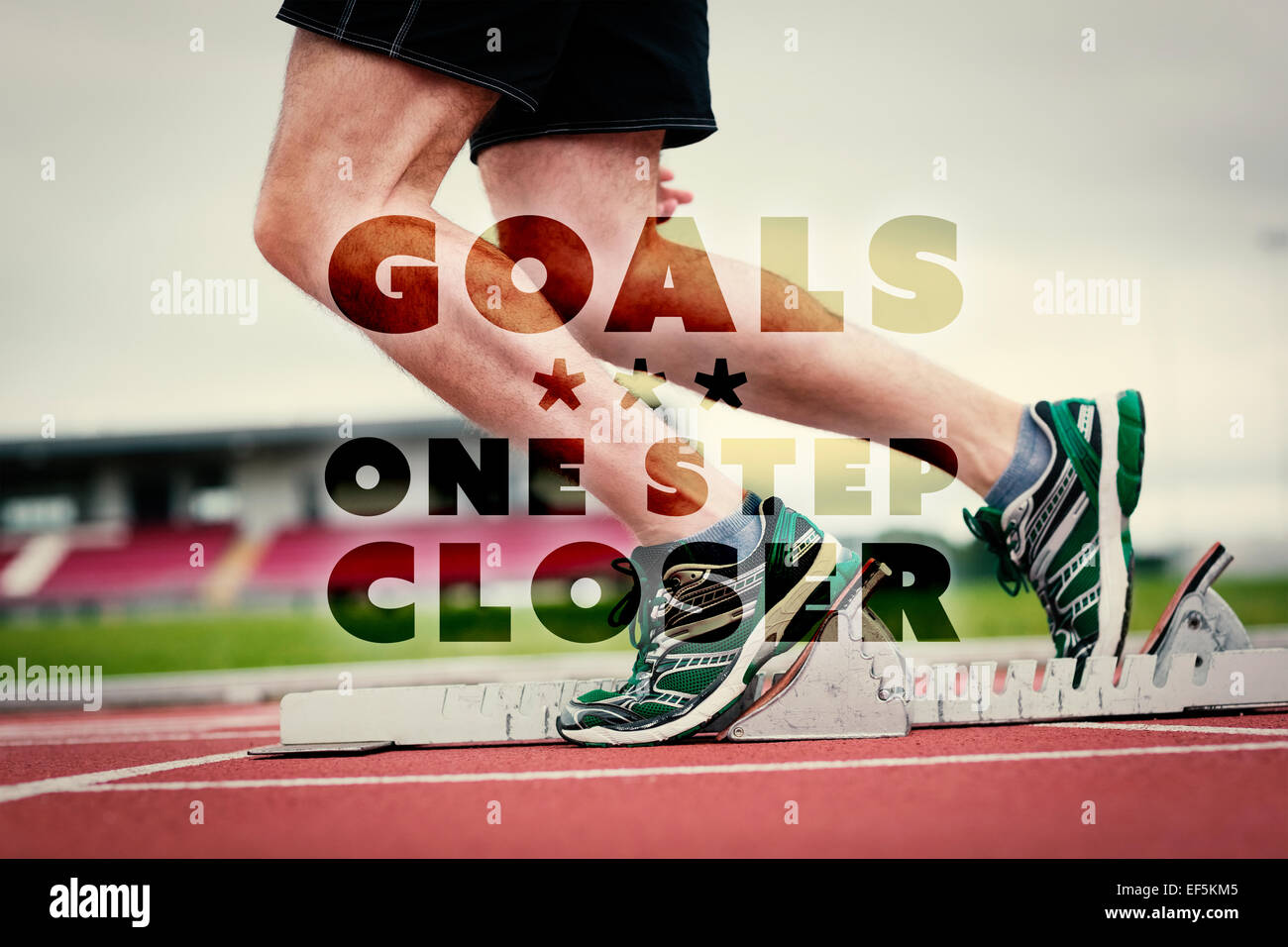 Composite image of low section of a man ready to race on running track ...