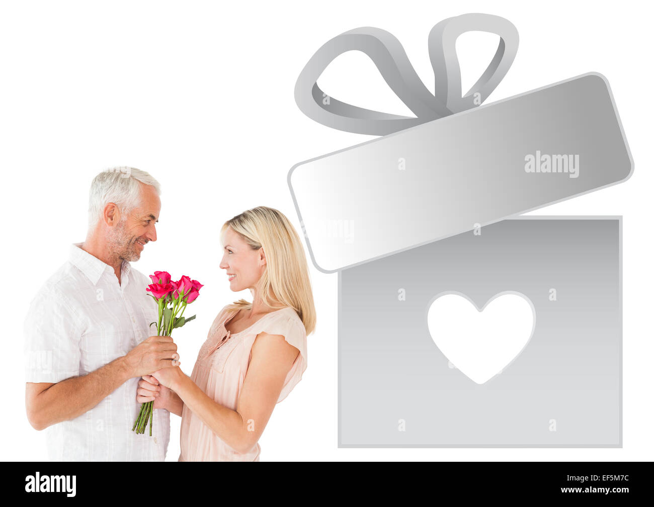Composite image of affectionate man offering his partner roses Stock ...