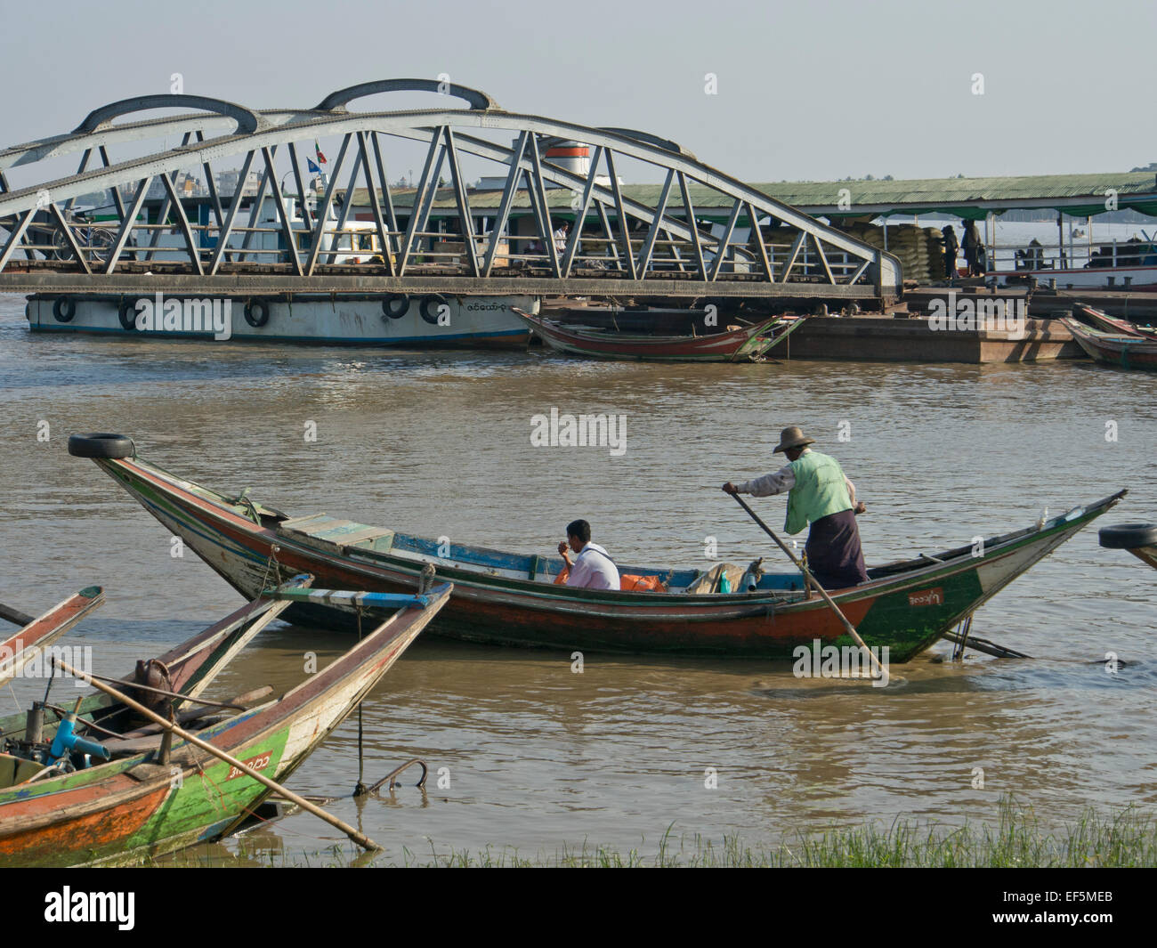 Passenger and fishing boats in the harbour in Yangon, Myanmar Stock ...