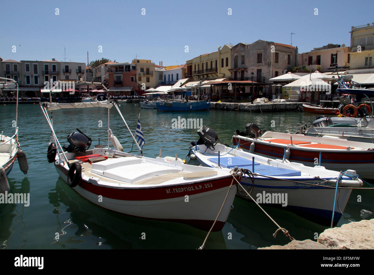 HARBOUR BUILDINGS & FISHING BOATS RETHYMNON CRETE GREECE 02 May 2014 ...