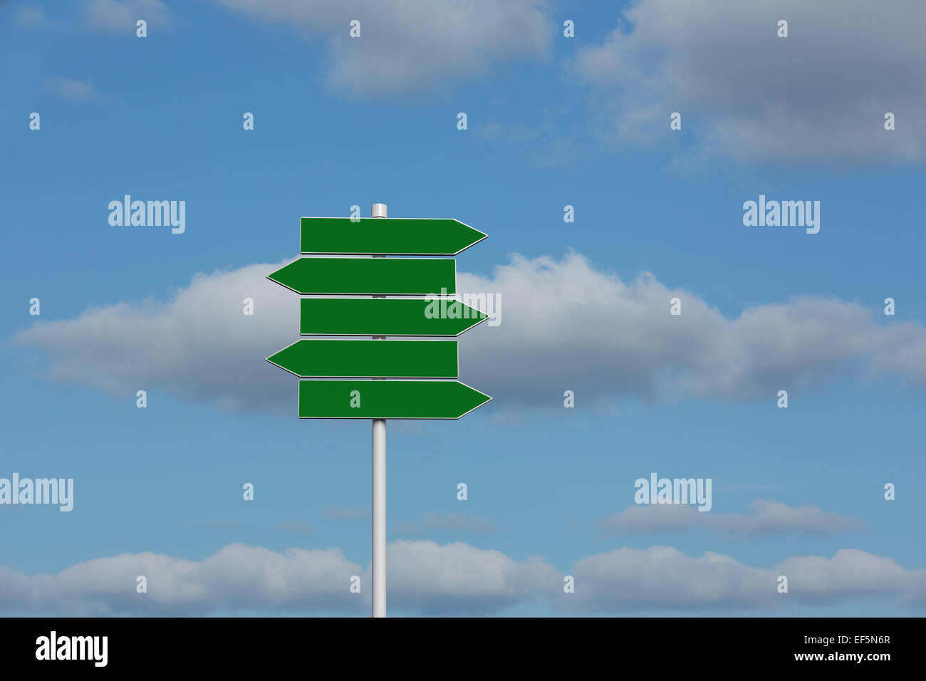Composite image of green signpost Stock Photo - Alamy
