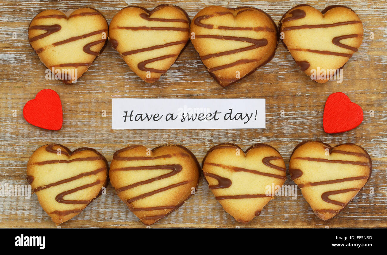 Have a sweet day card with heart shaped biscuits Stock Photo - Alamy
