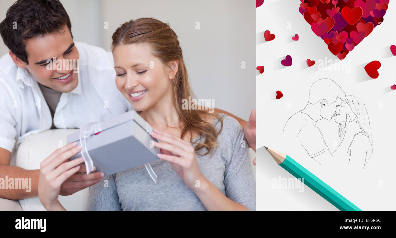 Composite image of cute valentines couple Stock Photo - Alamy