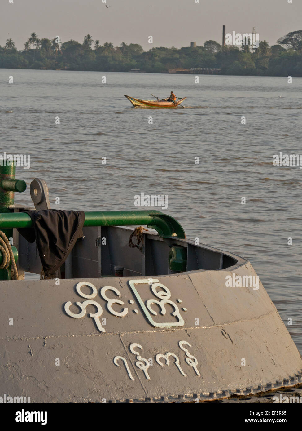 Passenger and fishing boats in the harbour in Yangon, Myanmar Stock ...