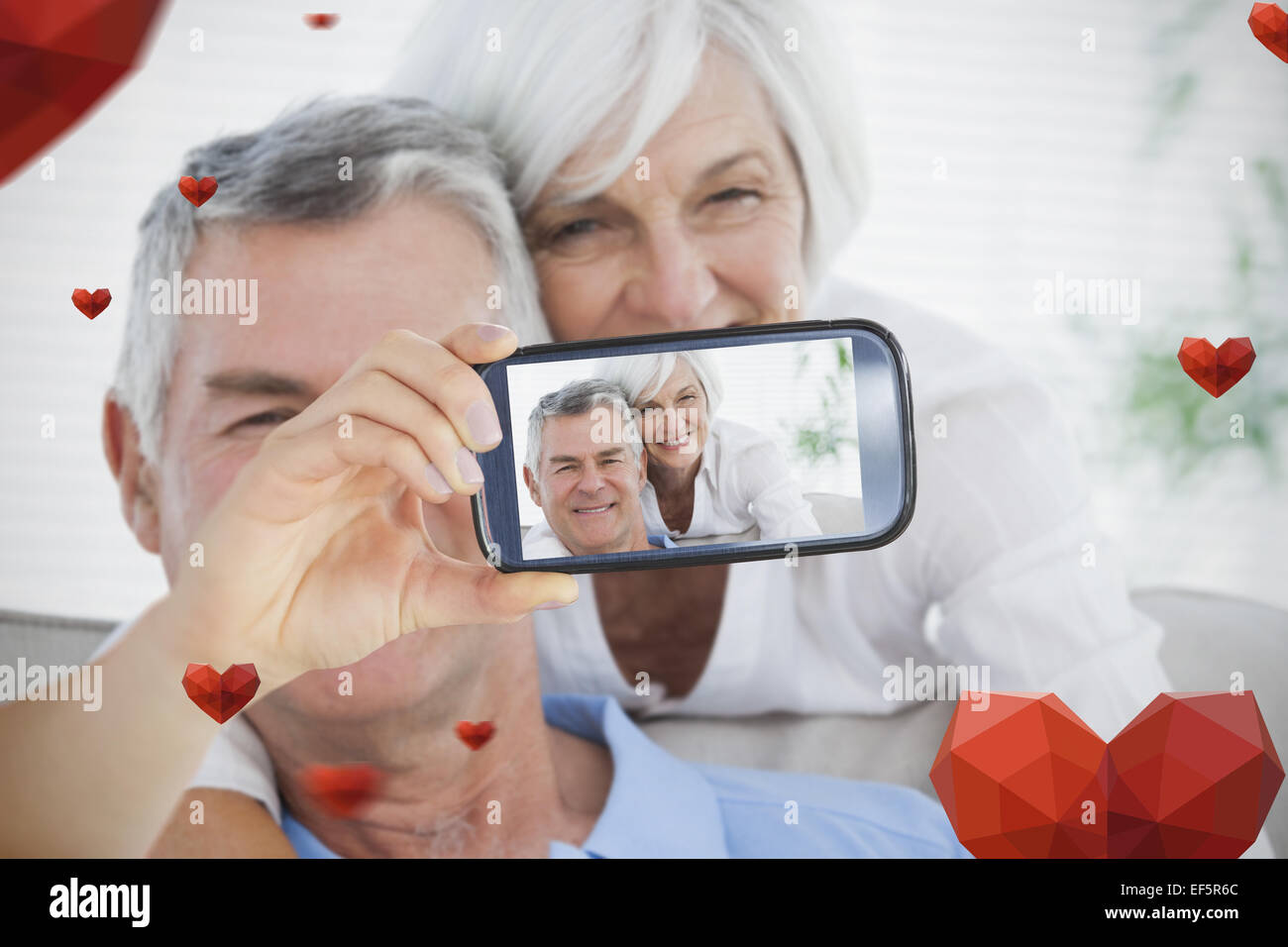 Composite image of valentines couple Stock Photo - Alamy