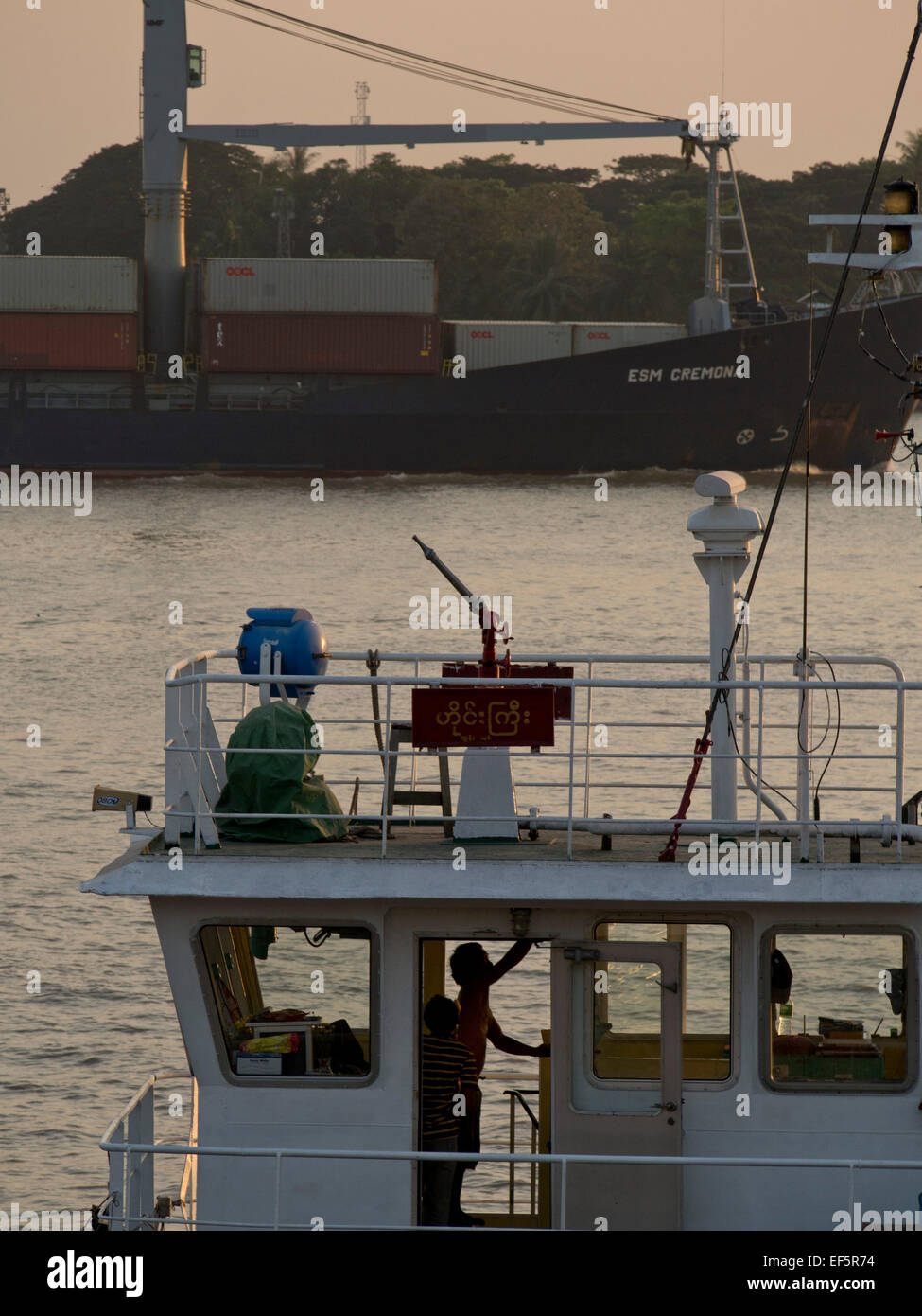 Passenger ferry at sunset in the harbour in Yangon, Myanmar Stock Photo ...