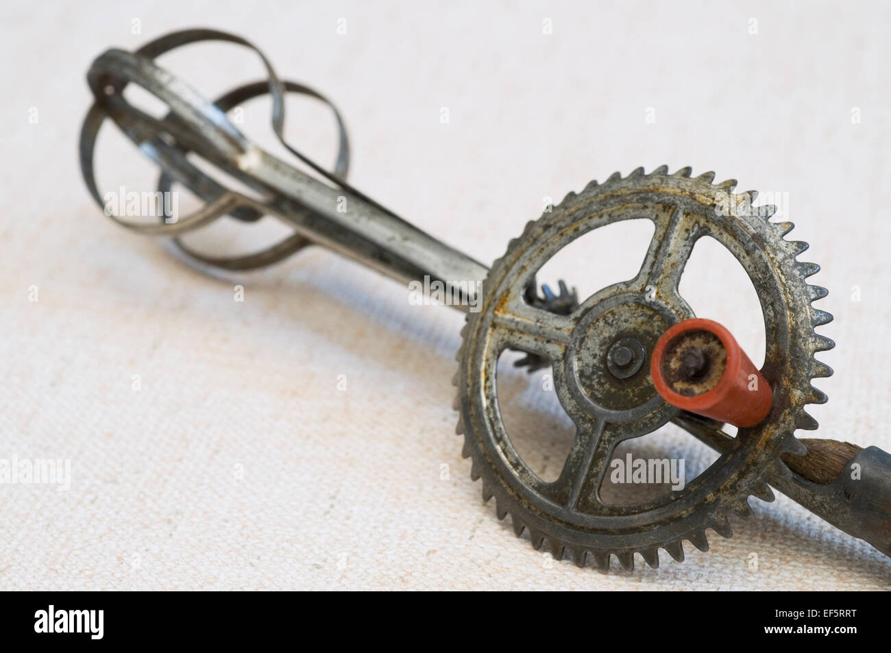old rotary egg beater Stock Photo - Alamy
