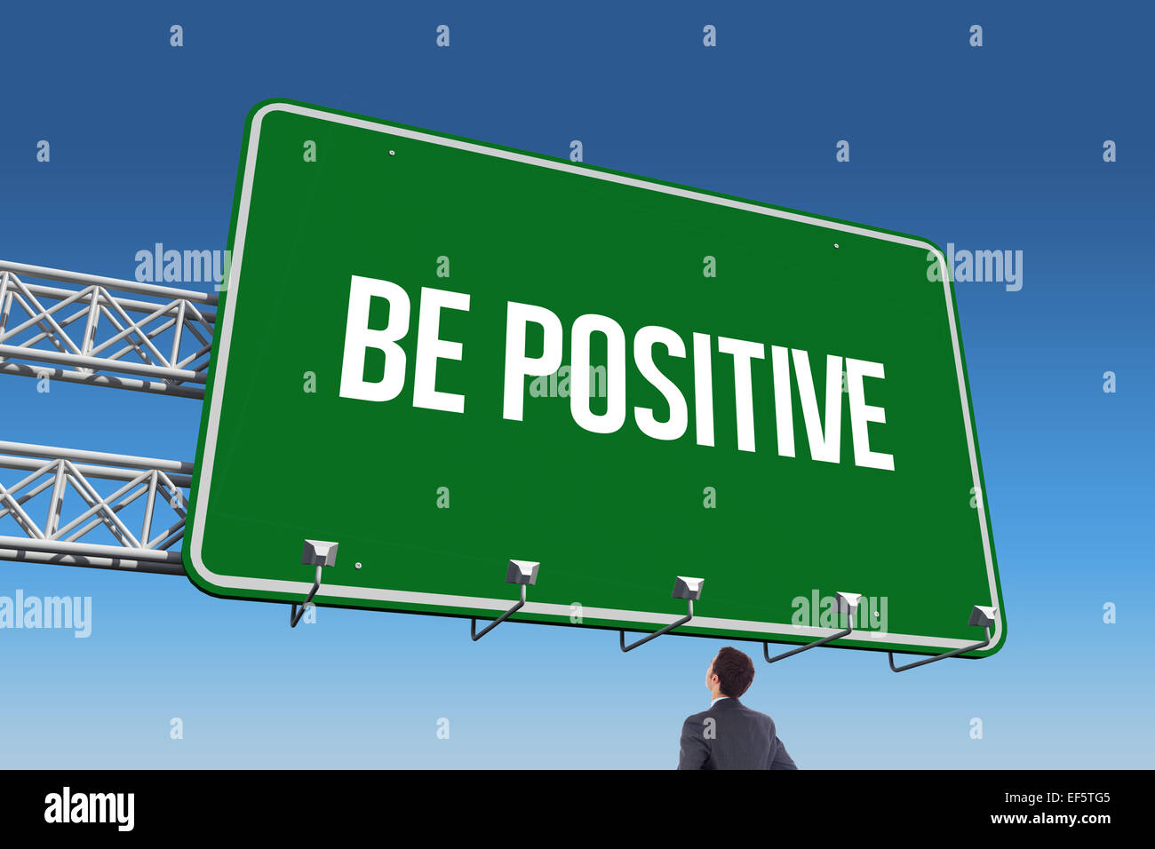 Be positive against blue sky Stock Photo - Alamy