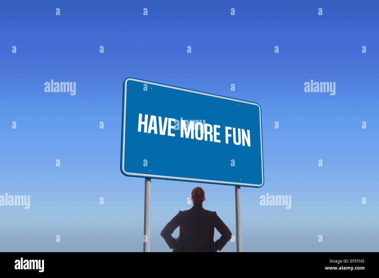 Have more fun against bright blue sky Stock Photo - Alamy