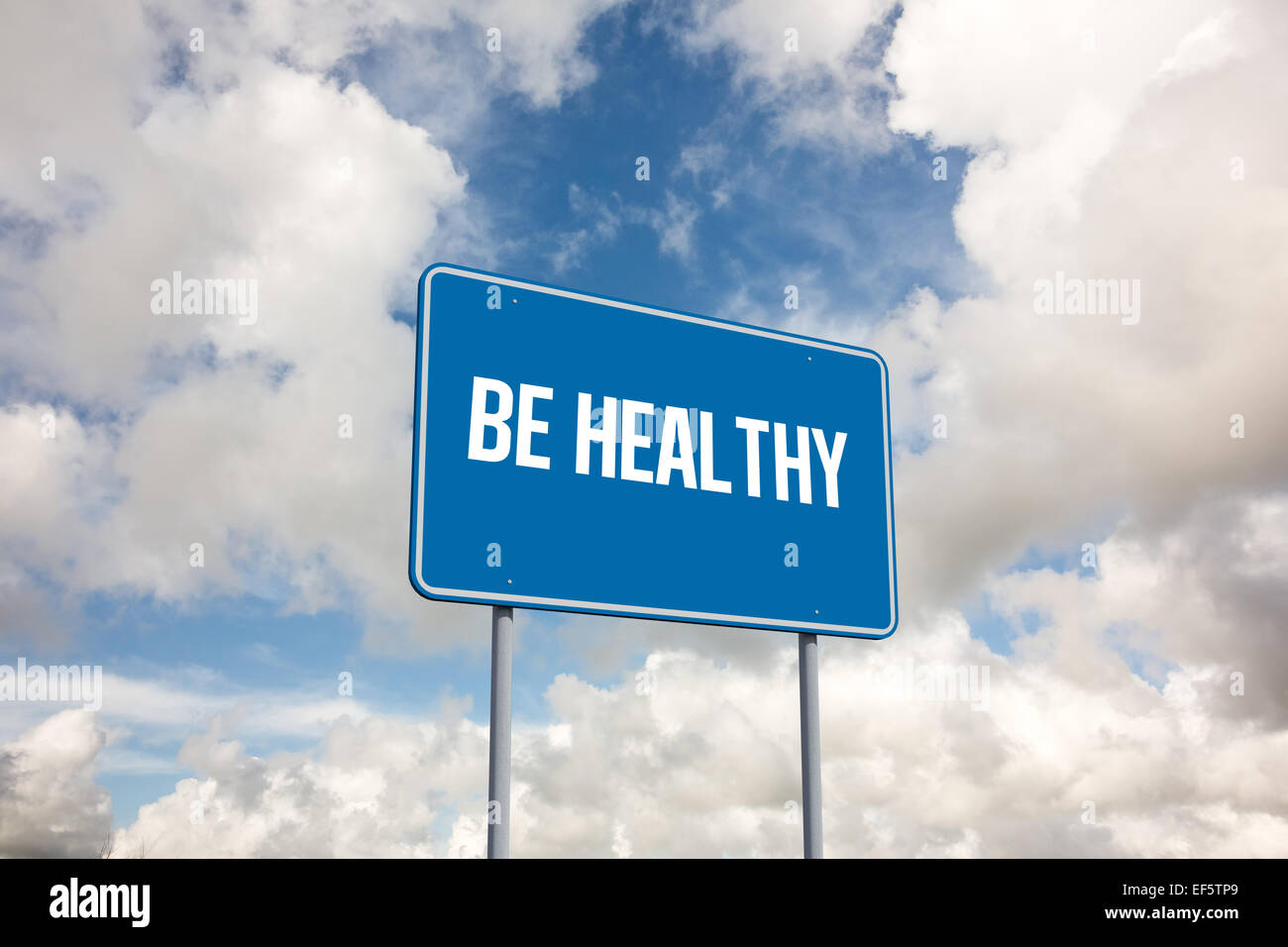Be healthy against blue sky with white clouds Stock Photo - Alamy