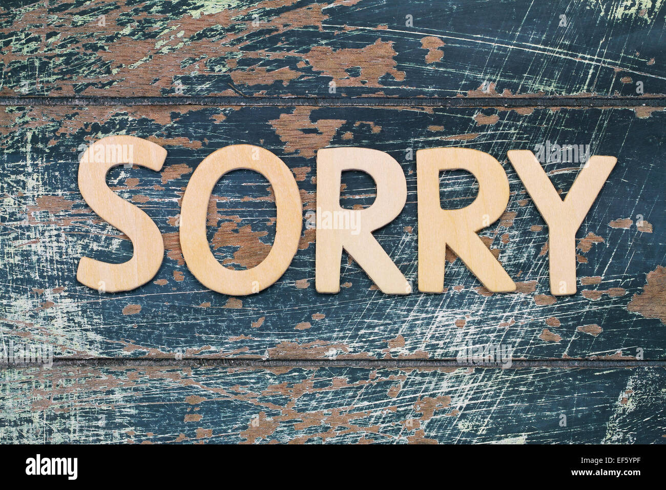 Sorry written with wooden letters on rustic blue surface Stock Photo ...