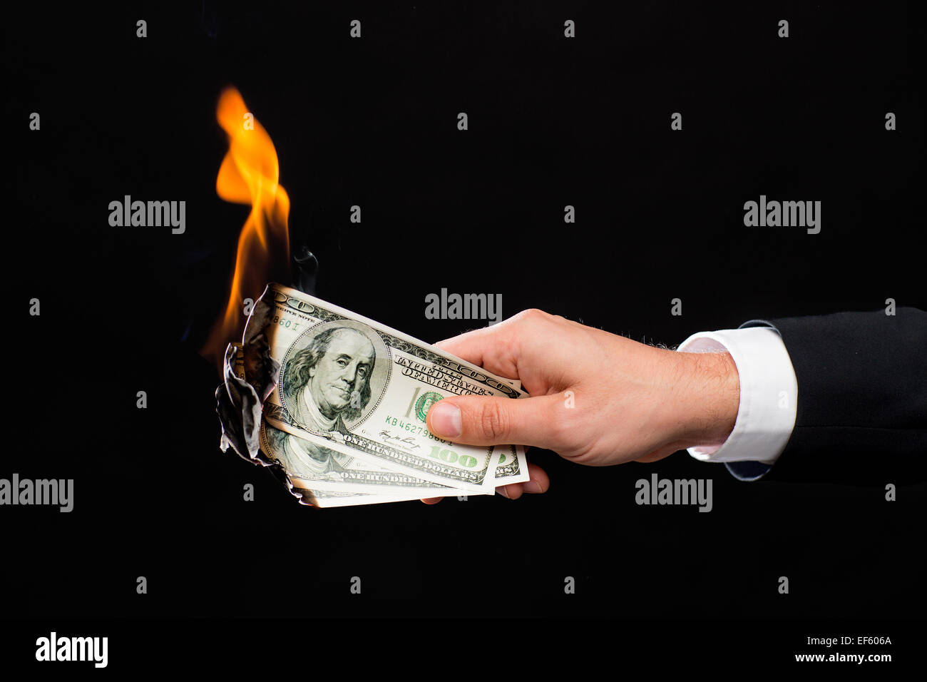 Man burning money hi-res stock photography and images - Alamy