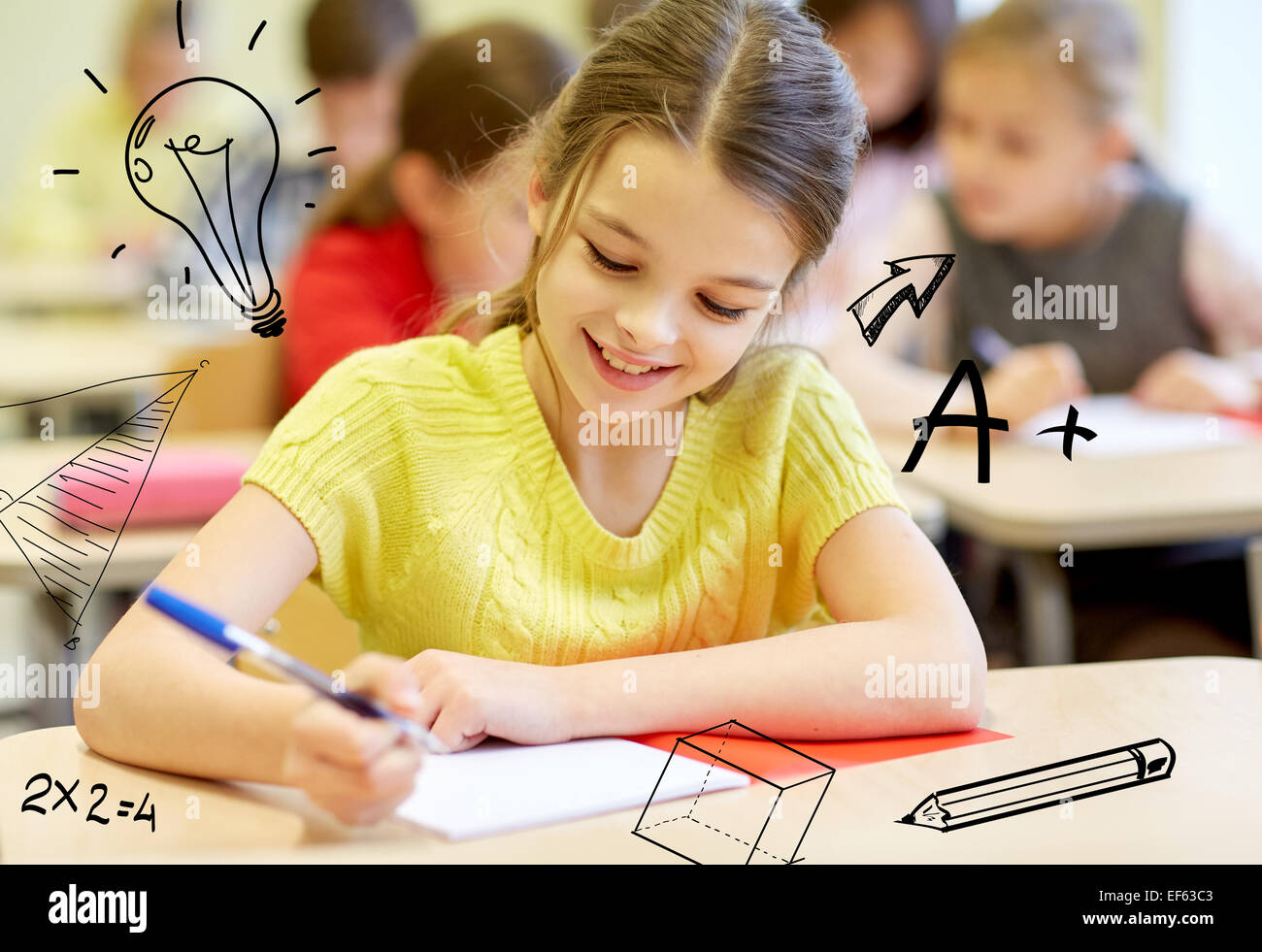 group of school kids writing test in classroom Stock Photo - Alamy