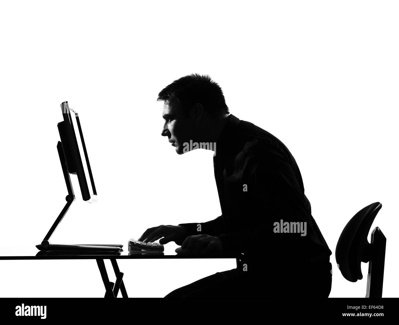 silhouette caucasian business man computing computing staring at the ...