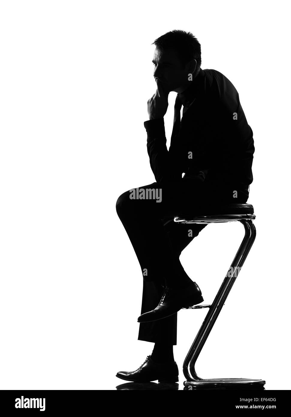 silhouette caucasian business man thinking pensive sititting on foot ...