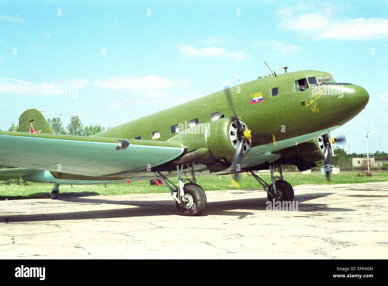 The Soviet passenger plane Li-2 to start the engine before takeoff ...