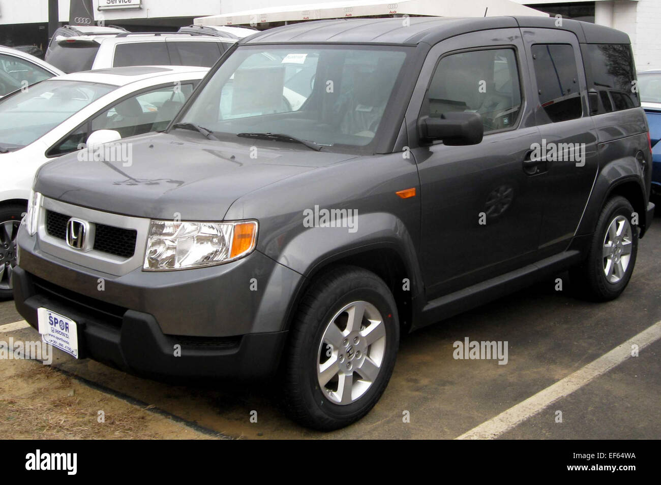 The 2009 Honda Element is a compact crossover SUV with a unique boxy ...