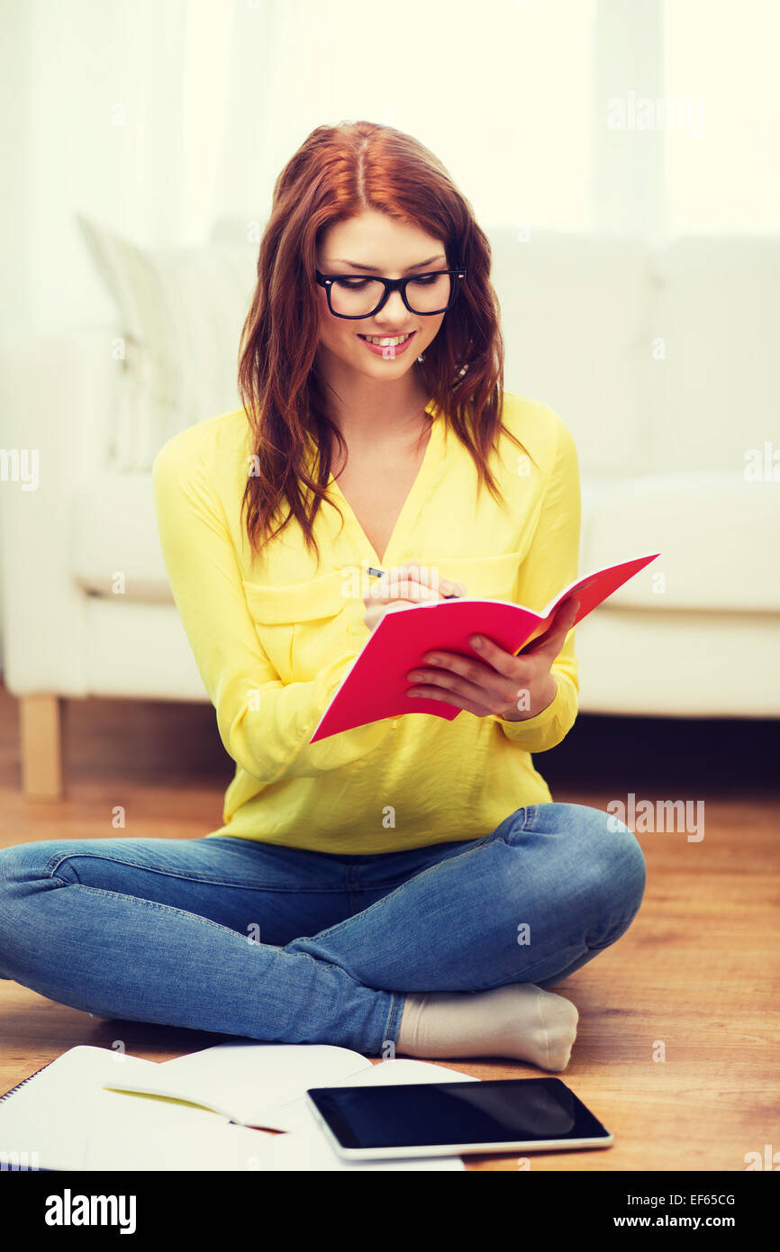 student with tablet pc computer and notebooks Stock Photo - Alamy