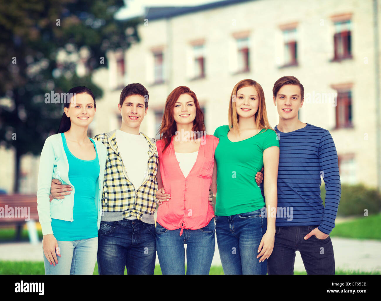 group of smiling students standing Stock Photo - Alamy