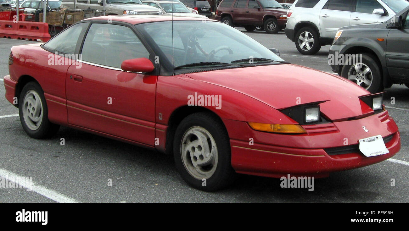 The first-generation Saturn SC, a compact coupe produced in the late ...
