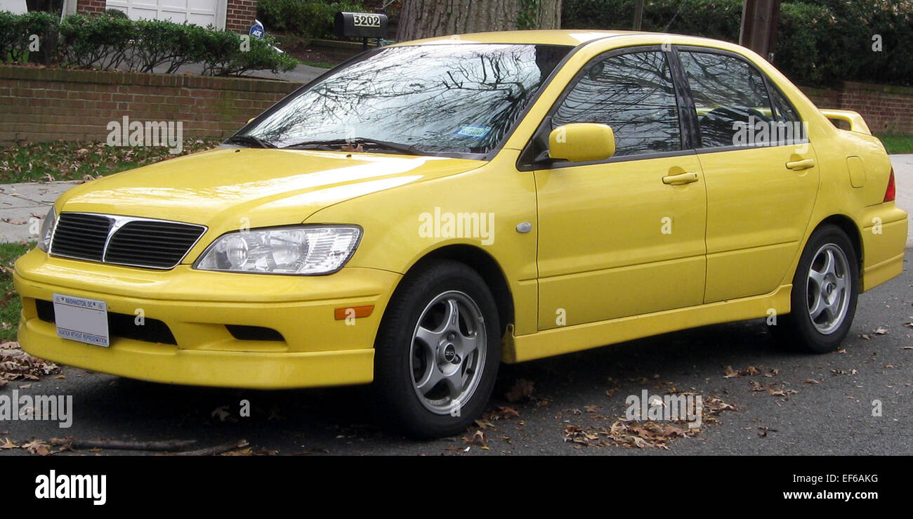 The 2002-2003 Mitsubishi Lancer OZ Rally is a compact sedan offering ...