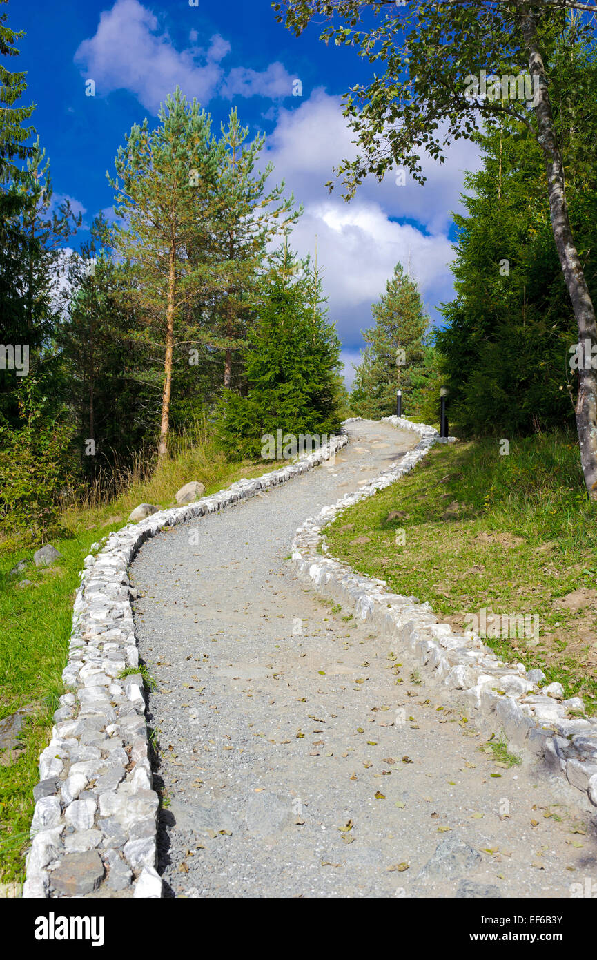 Beautiful pathway edged with stones Stock Photo - Alamy