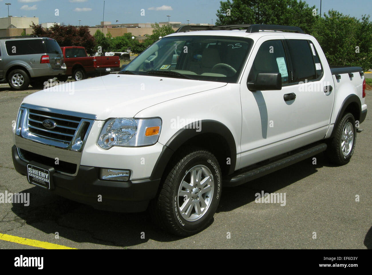 The 2009 Ford Sport Trac XLT is a versatile pickup truck with a unique ...