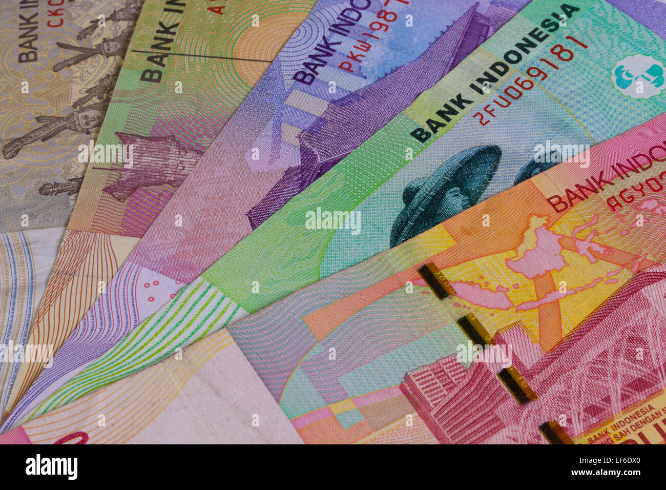 Different Indonesian rupiah banknotes on the table Stock Photo - Alamy